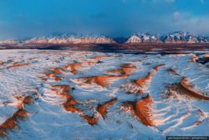 The snow-covered Chara Sands in Eastern Siberia · Russia Travel Blog